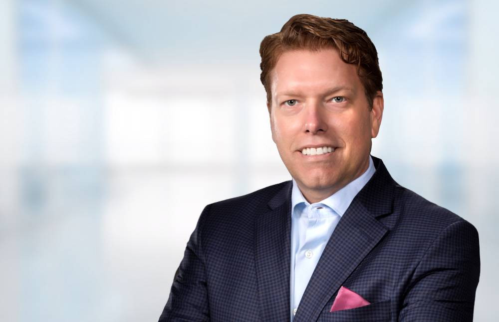 Systemic Approach to Reskilling Leaders in Industry 4.0